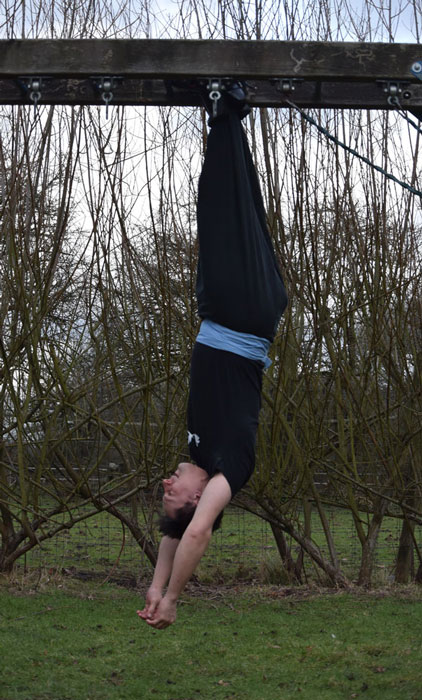 Hanging Upside Down By One Leg